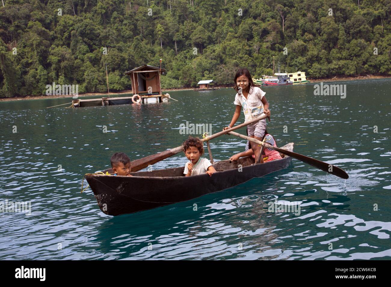 Asian girl rowing on boat hi-res stock photography and images - Alamy