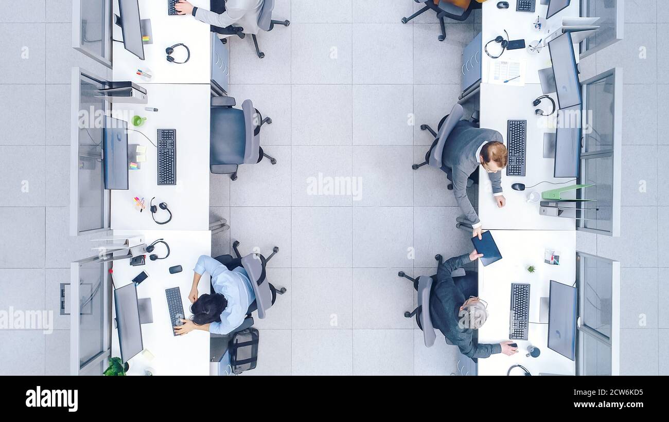 Rows of people working computers hi-res stock photography and images ...