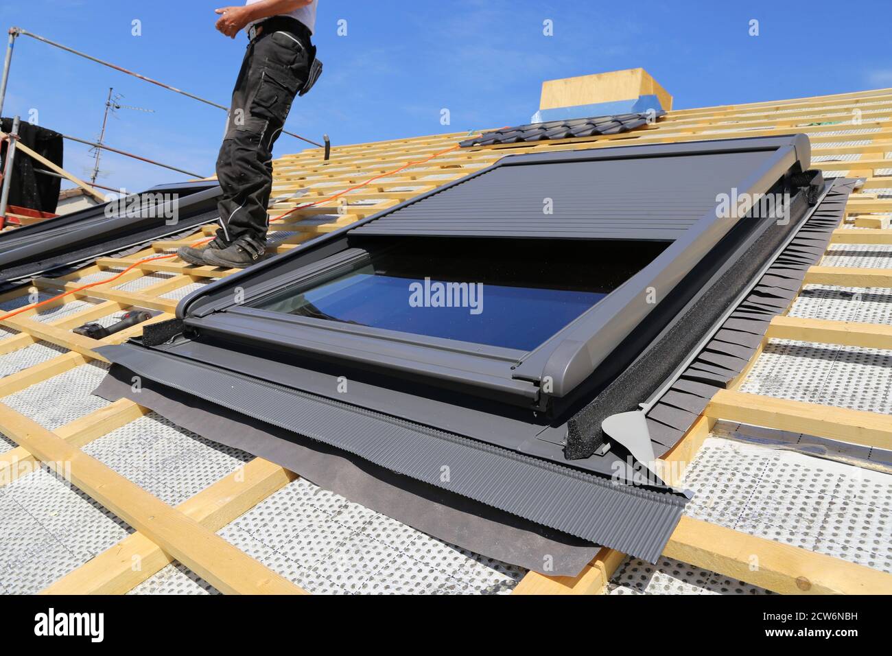 Installation and assembly of new roof windows as part of a roof ...