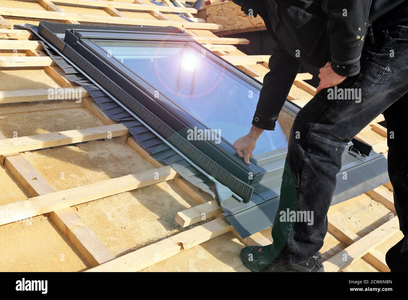 Installation and assembly of new roof windows as part of a roof ...