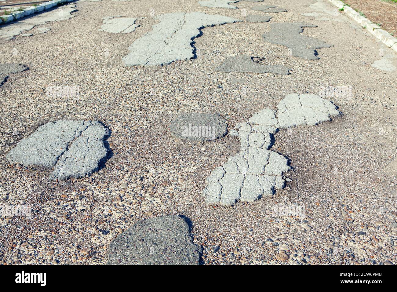 Part damaged asphalt road hi-res stock photography and images - Alamy