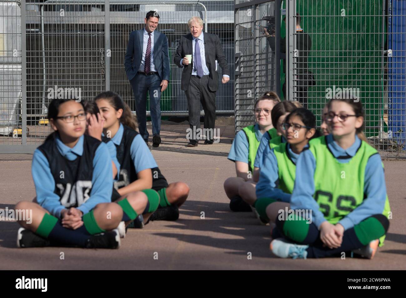 Prime Minister Boris Johnson meets pupils and takes part in a game of ...