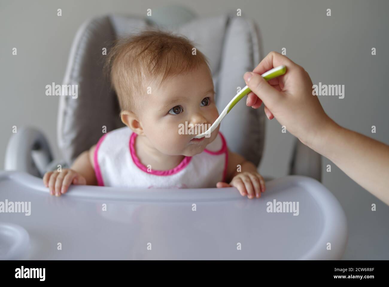 Food feeding nutrition parent girl hi-res stock photography and images ...