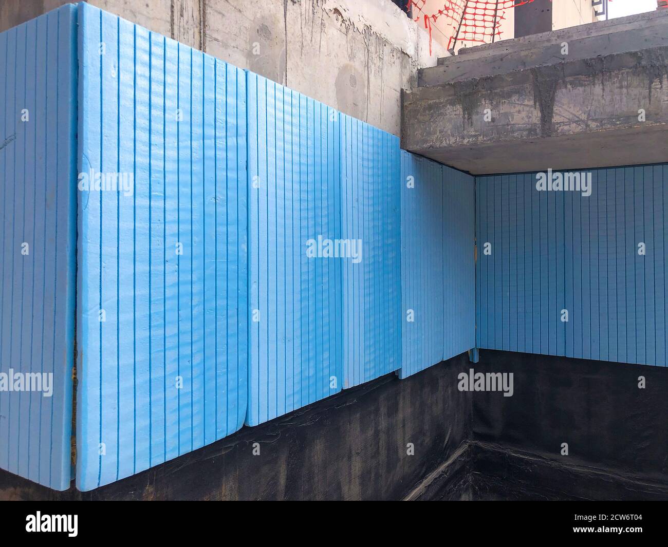Waterproofing and thermal insulation of concrete building walls Stock ...