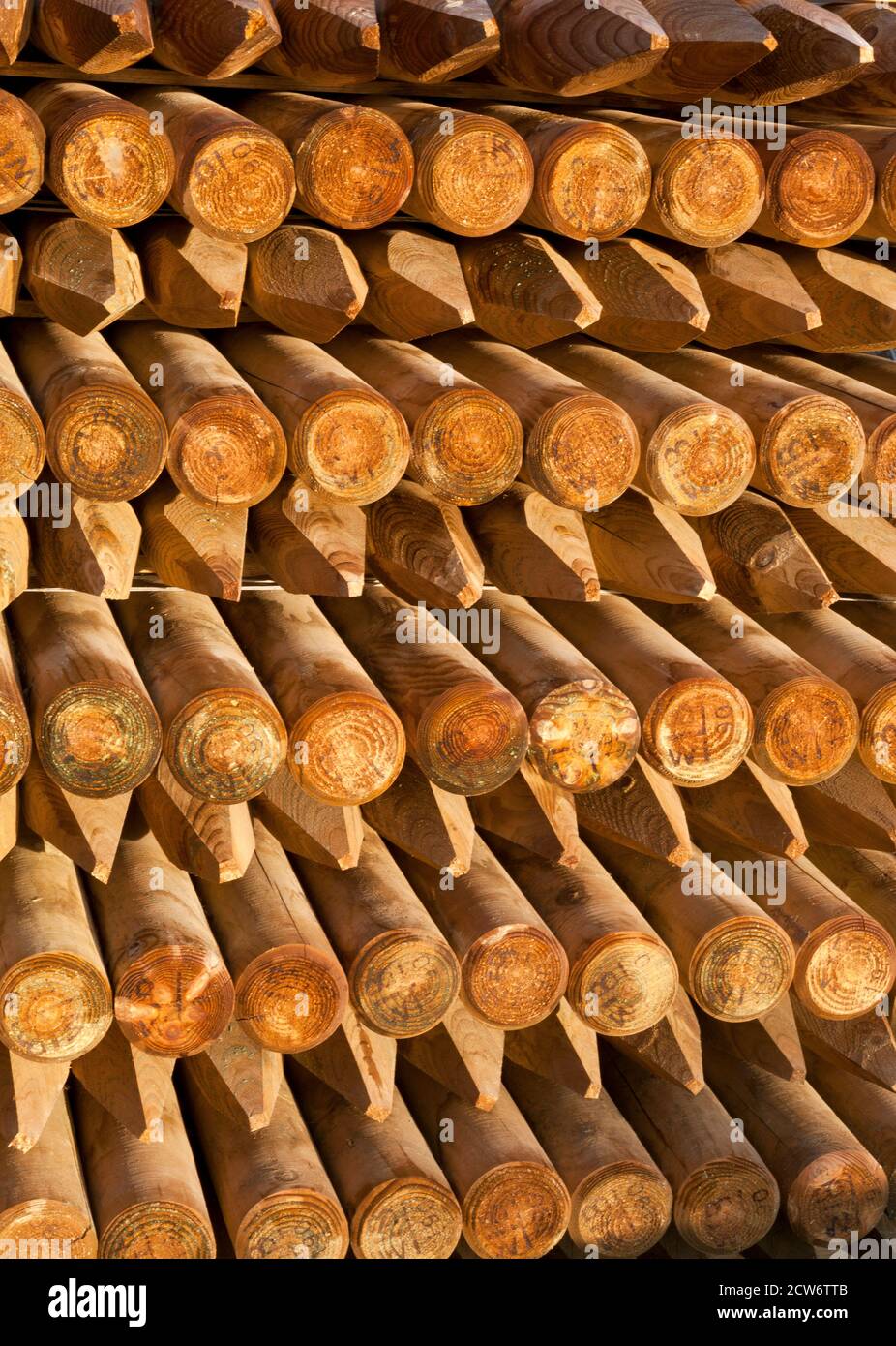 A pack of wooden posts Stock Photo - Alamy