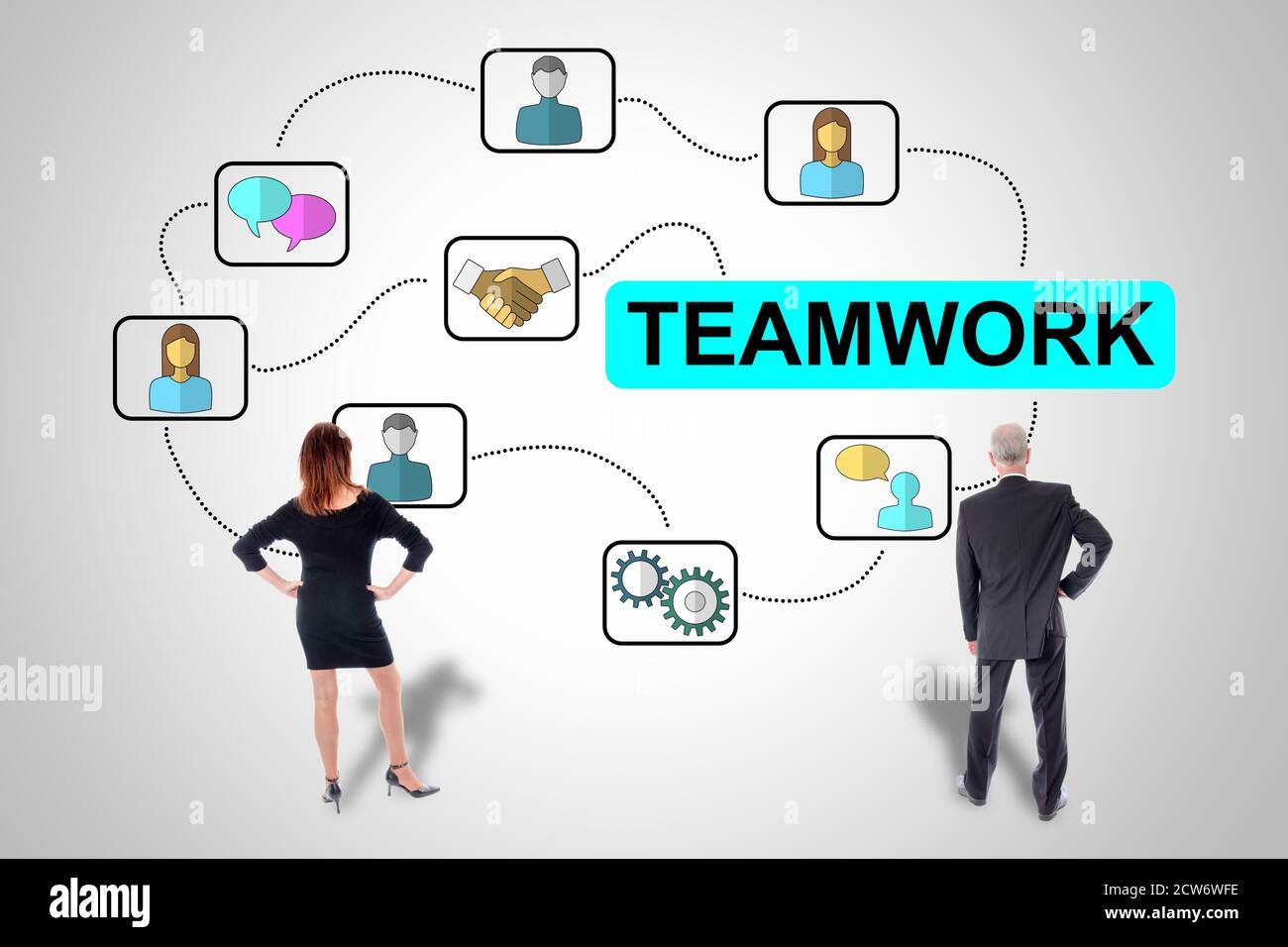 Teamwork concept drawn on a wall watched by business people Stock Photo ...