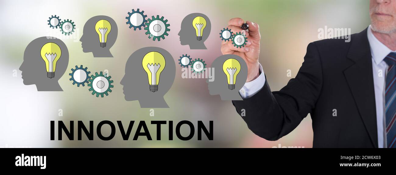 Businessman drawing an innovation concept Stock Photo - Alamy