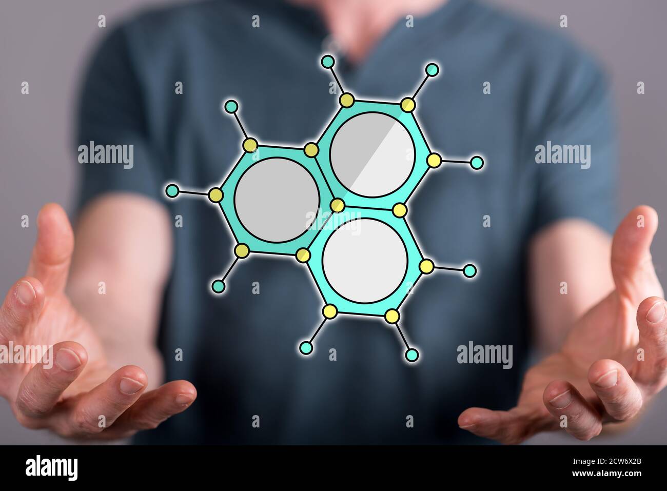 Scientific research concept between hands of a man in background Stock ...