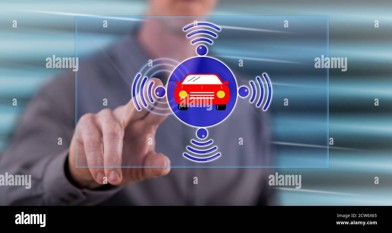 Man touching a smart car concept on a touch screen with his finger ...