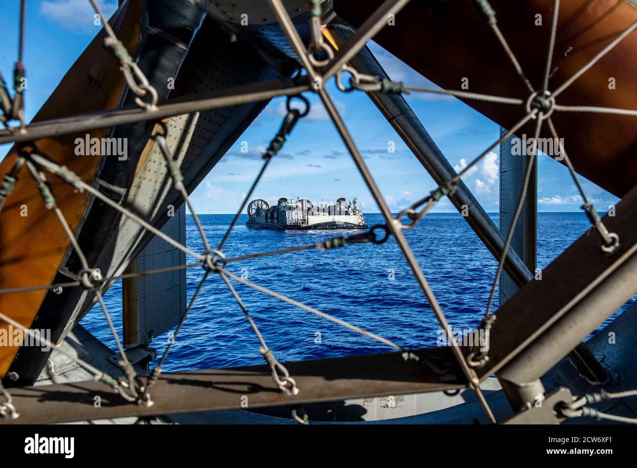 PHILIPPINE SEA (Sept. 27, 2020) As seen through the propellers of ...