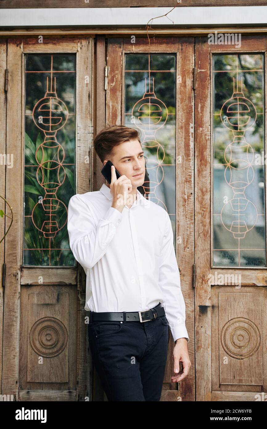 Beautiful young man talking hi-res stock photography and images - Alamy