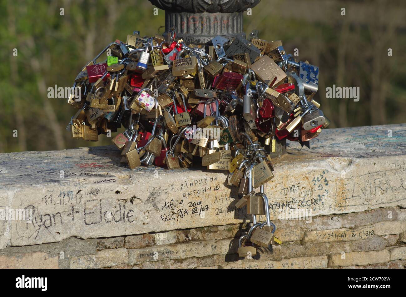 a series of locks of lovers on a famous rome bridge Stock Photo - Alamy