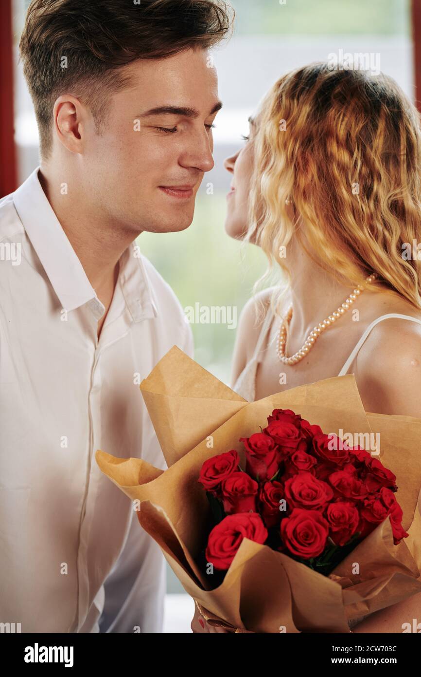 Kissing on cheeks Stock Photo - Alamy