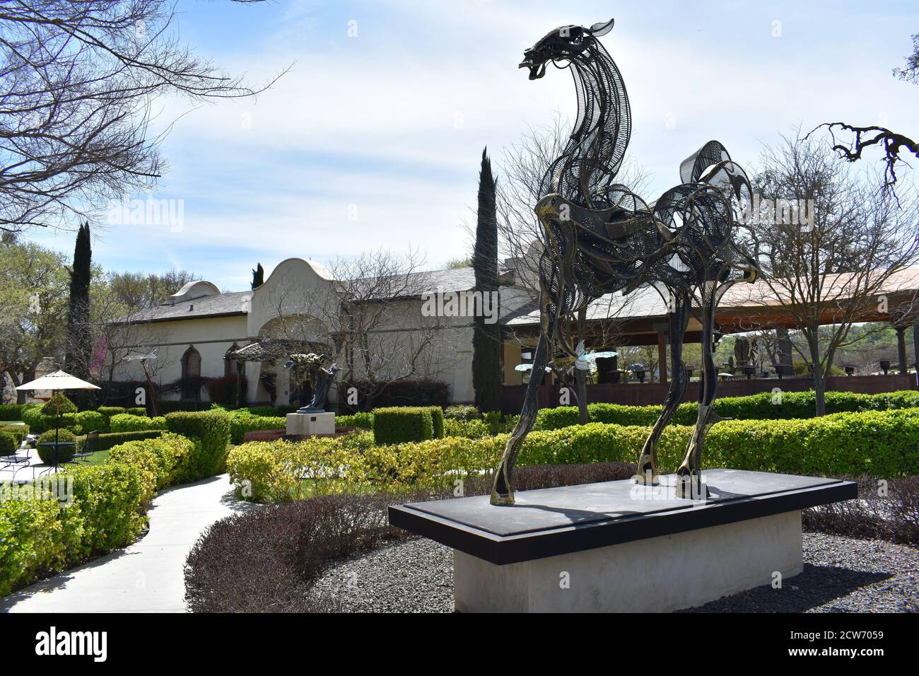 Park with modern sculptures and bushes Stock Photo - Alamy