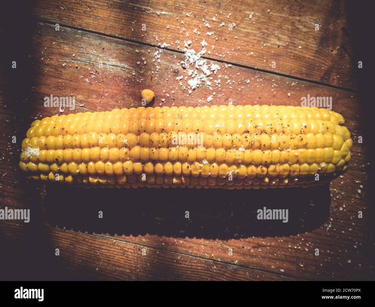Sweet corn on the table with salt Stock Photo - Alamy