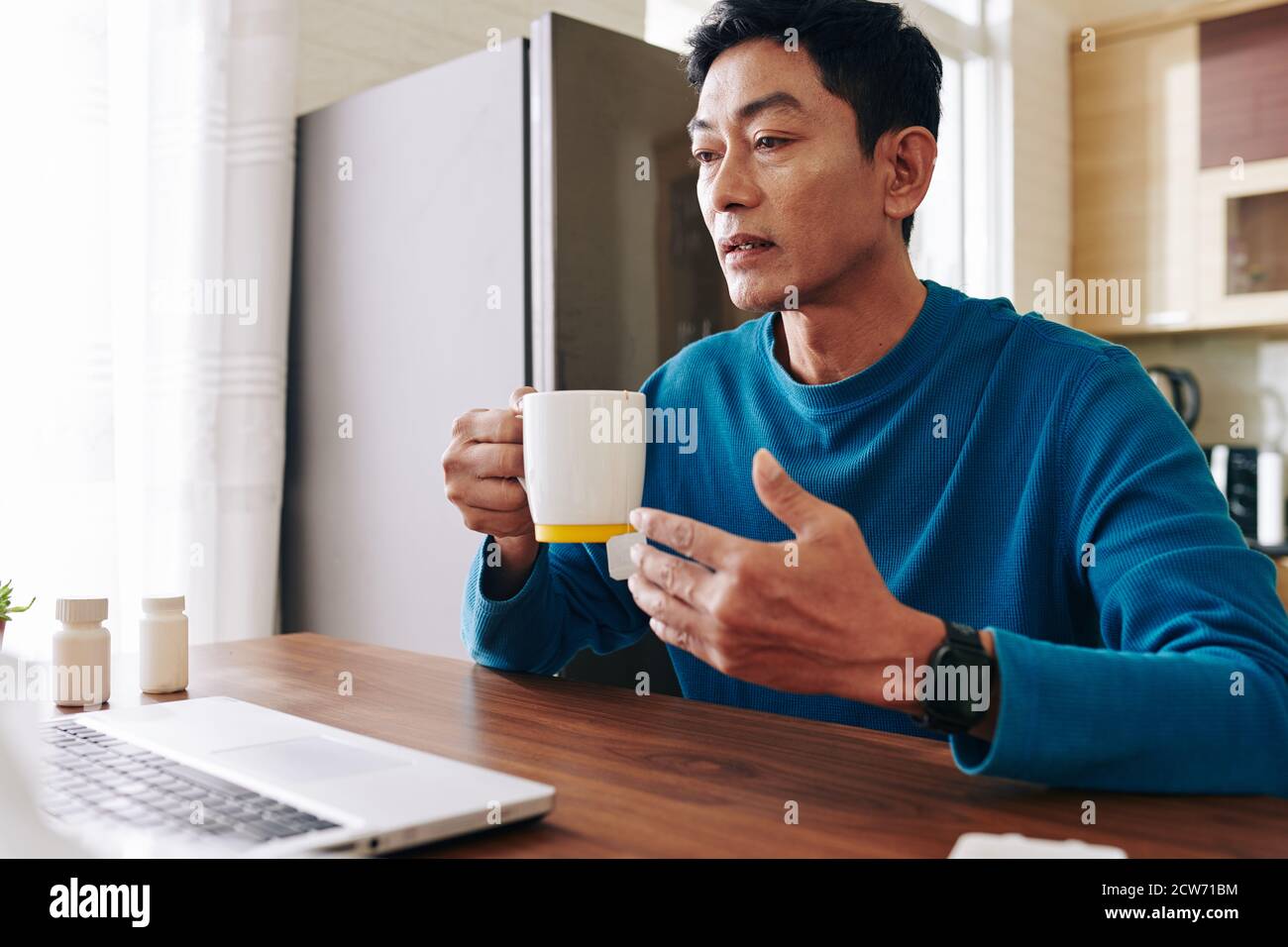 Person sick laptop hi-res stock photography and images - Alamy