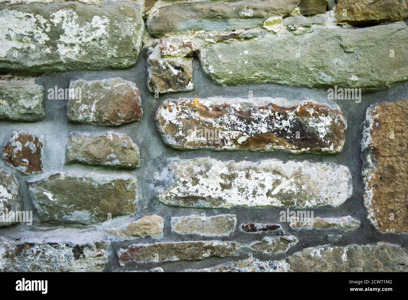 texture of masonry, the fragment of a stone wall of an ancient temple ...