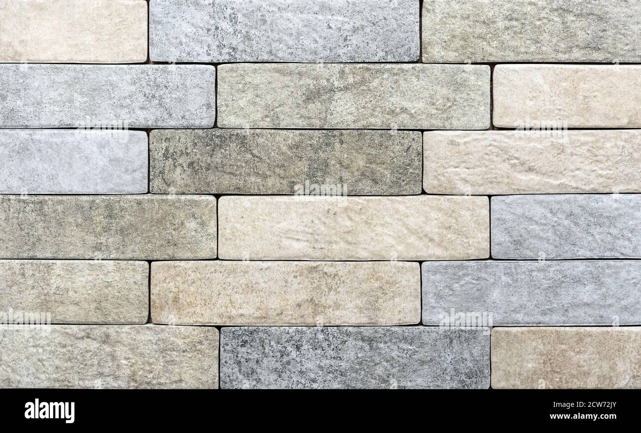 Decorative finishing stone. Texture of a rough stone wall. Background ...