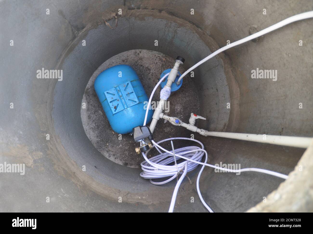 Installation of a water borehole pump station in a precast manhole ring ...