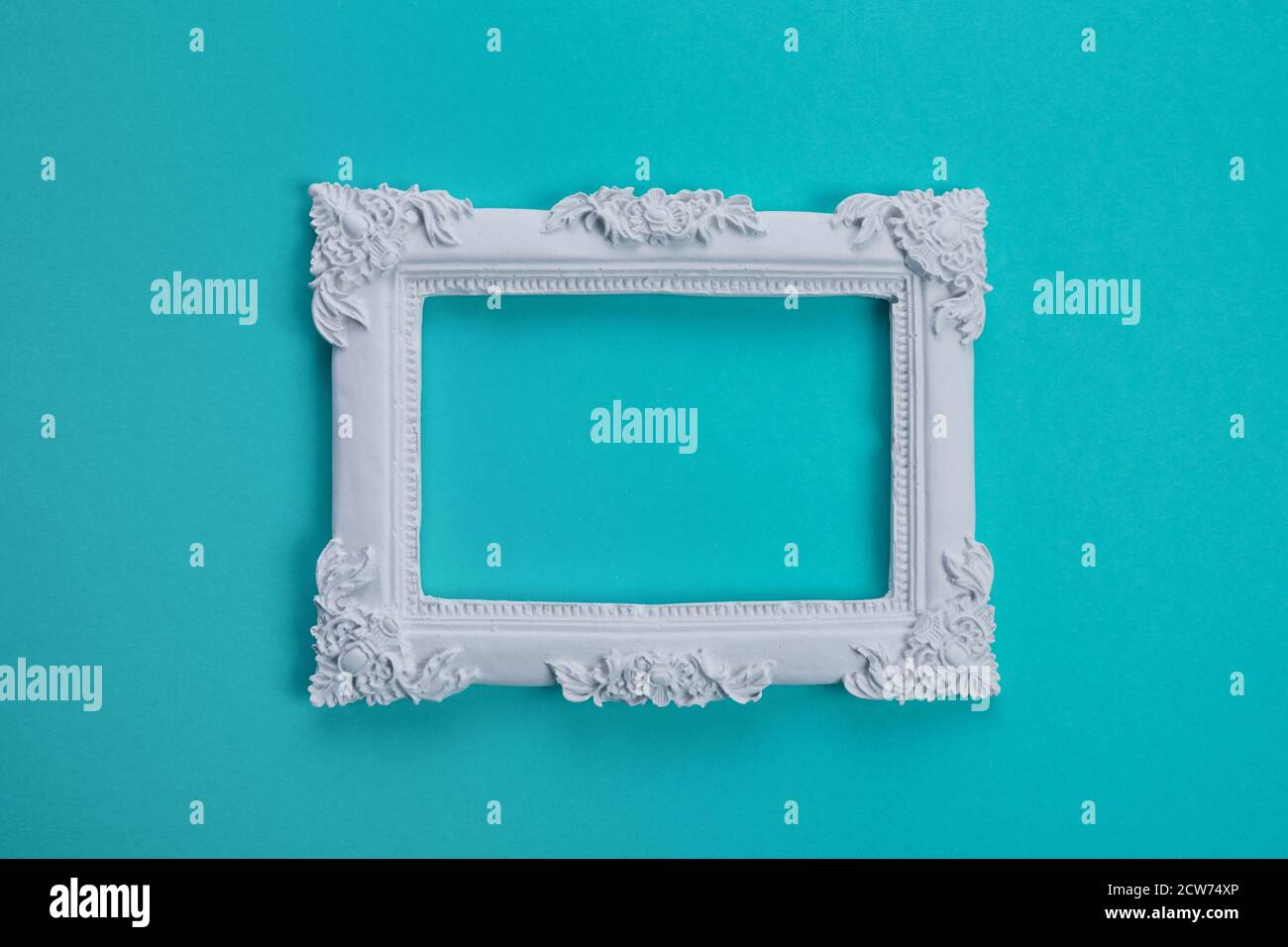 Aqua color paper with white vintage frame. Aqua colour of the year 2021 ...