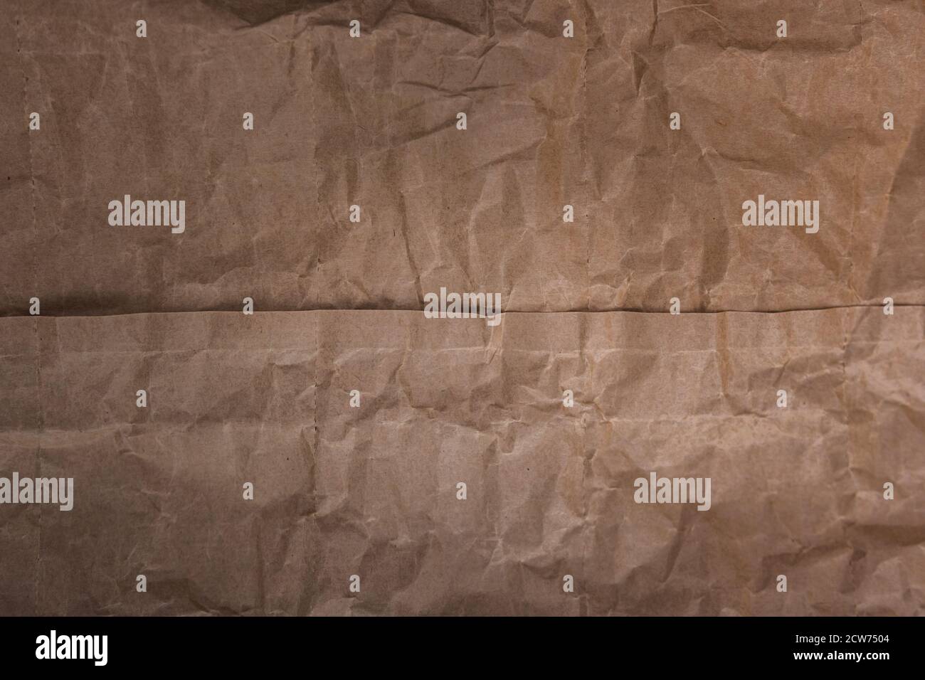 Crumpled kraft paper background. Packing paper. Background Stock Photo ...