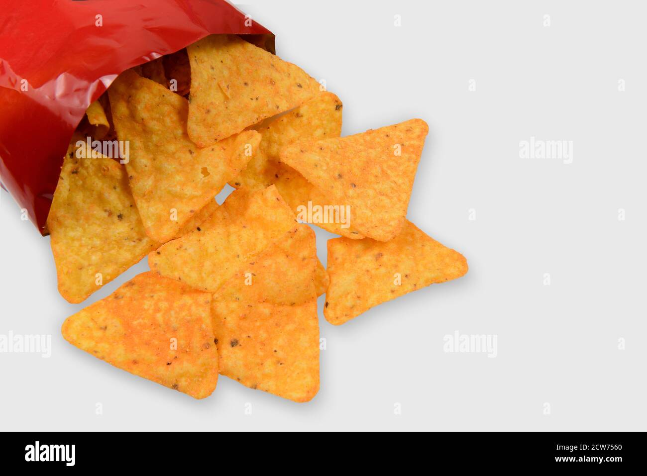 Open bag of crisps a ultra processed food Stock Photo - Alamy