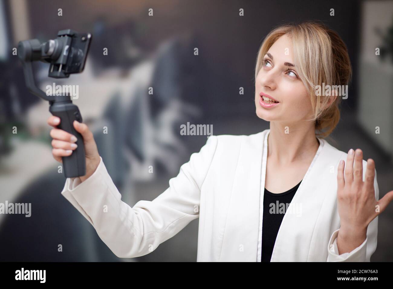 Woman recording lecture on hi-res stock photography and images - Alamy