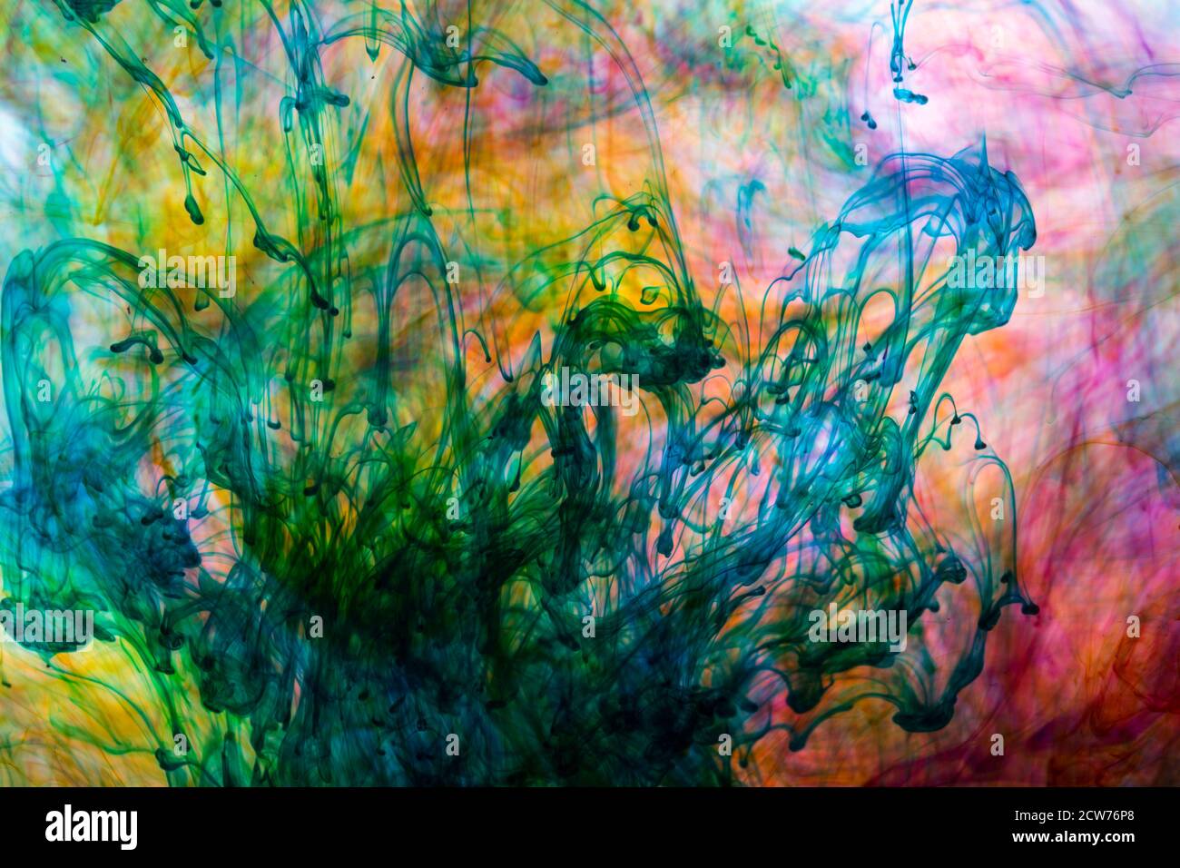 Acrylic colors and ink in water. Abstract background Stock Photo - Alamy