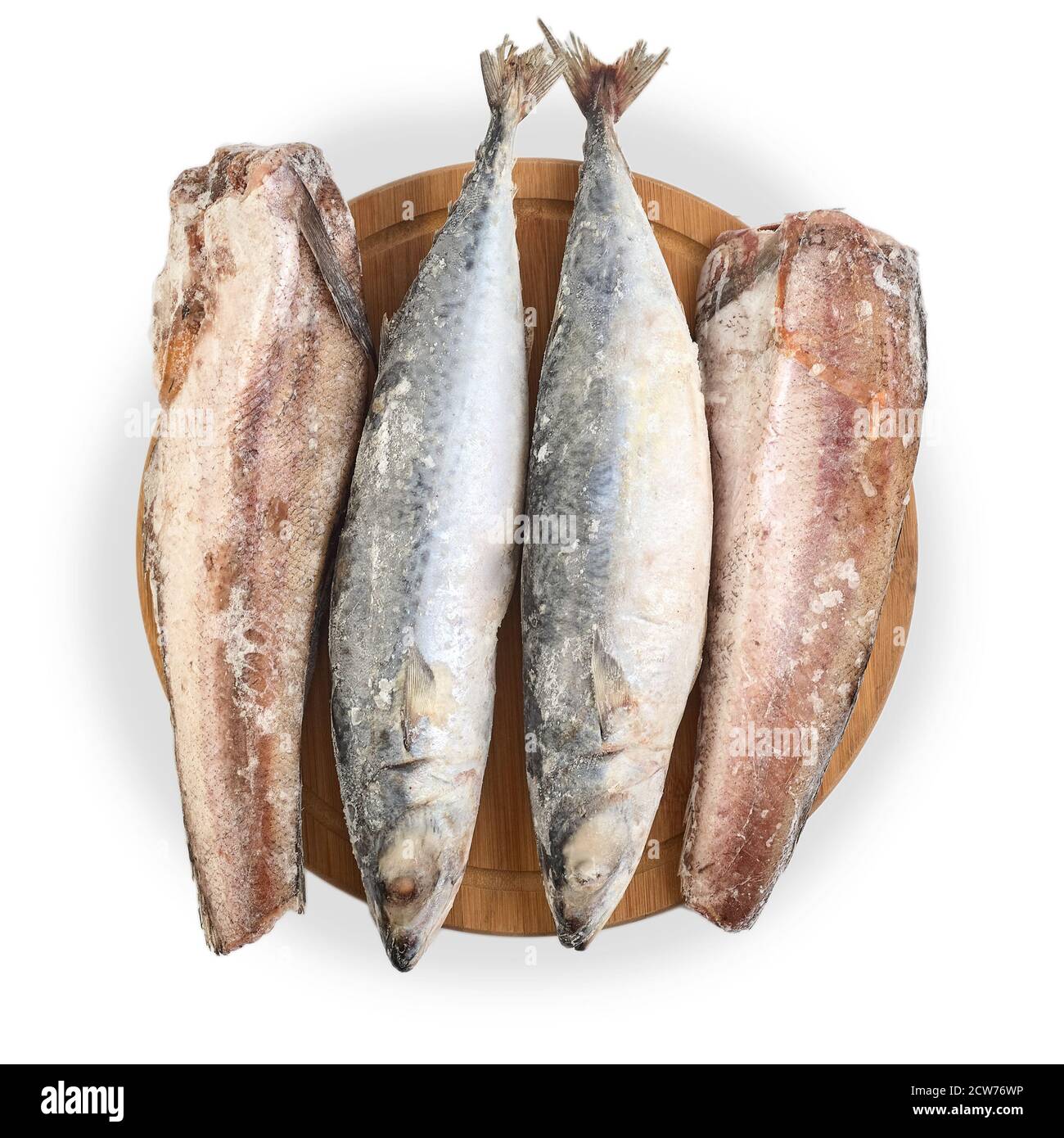 Frozen mackerel and hake isolated on white background. Assortment of ...