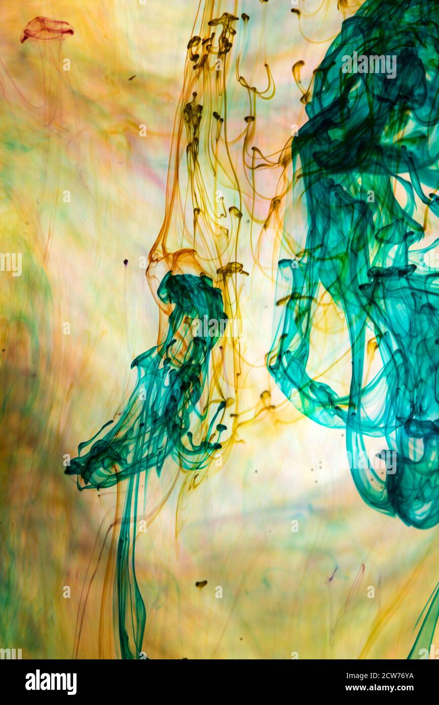 Acrylic colors and ink in water. Abstract background Stock Photo - Alamy