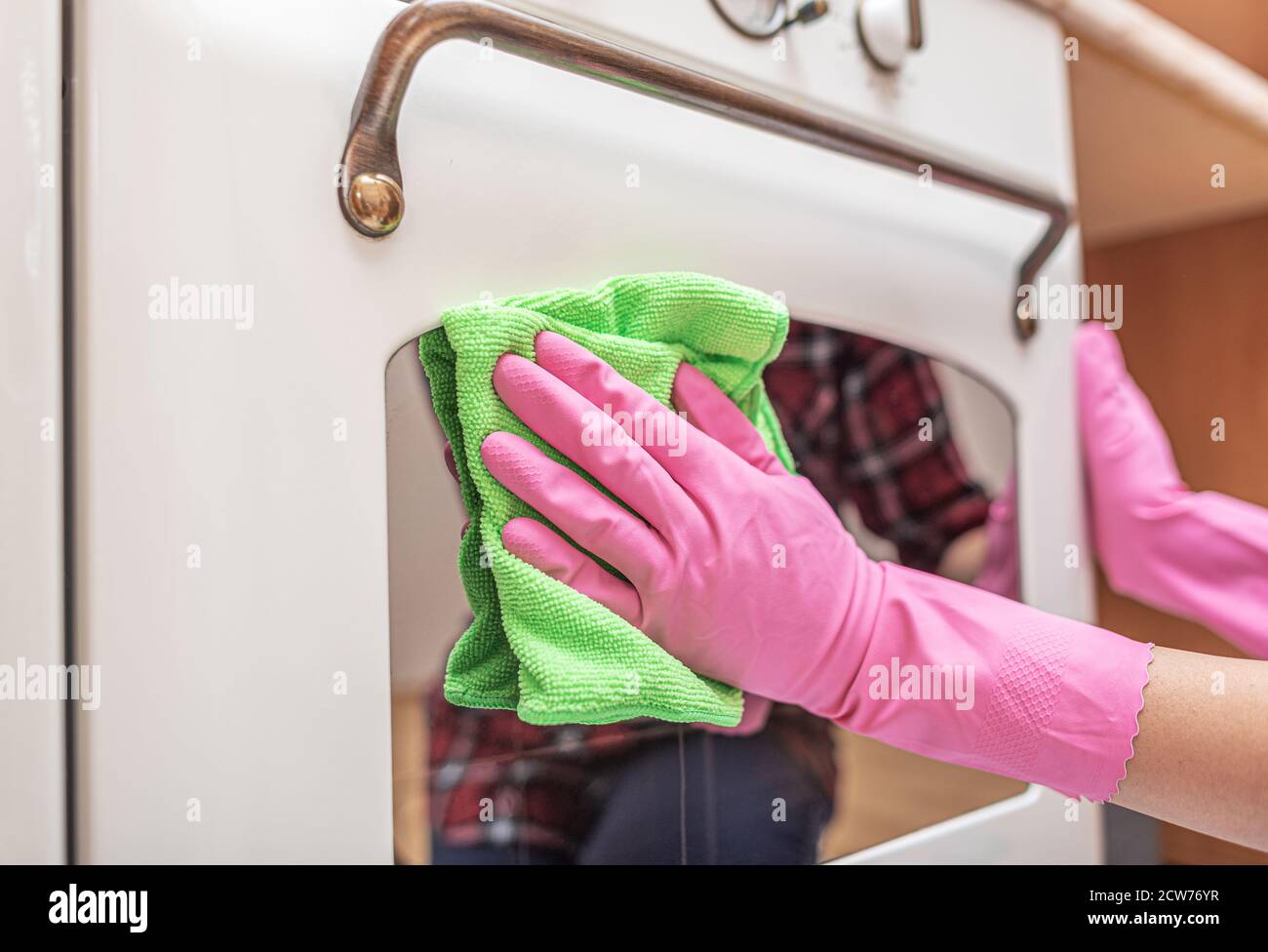 Woman wet cleaning cloth hi-res stock photography and images - Alamy