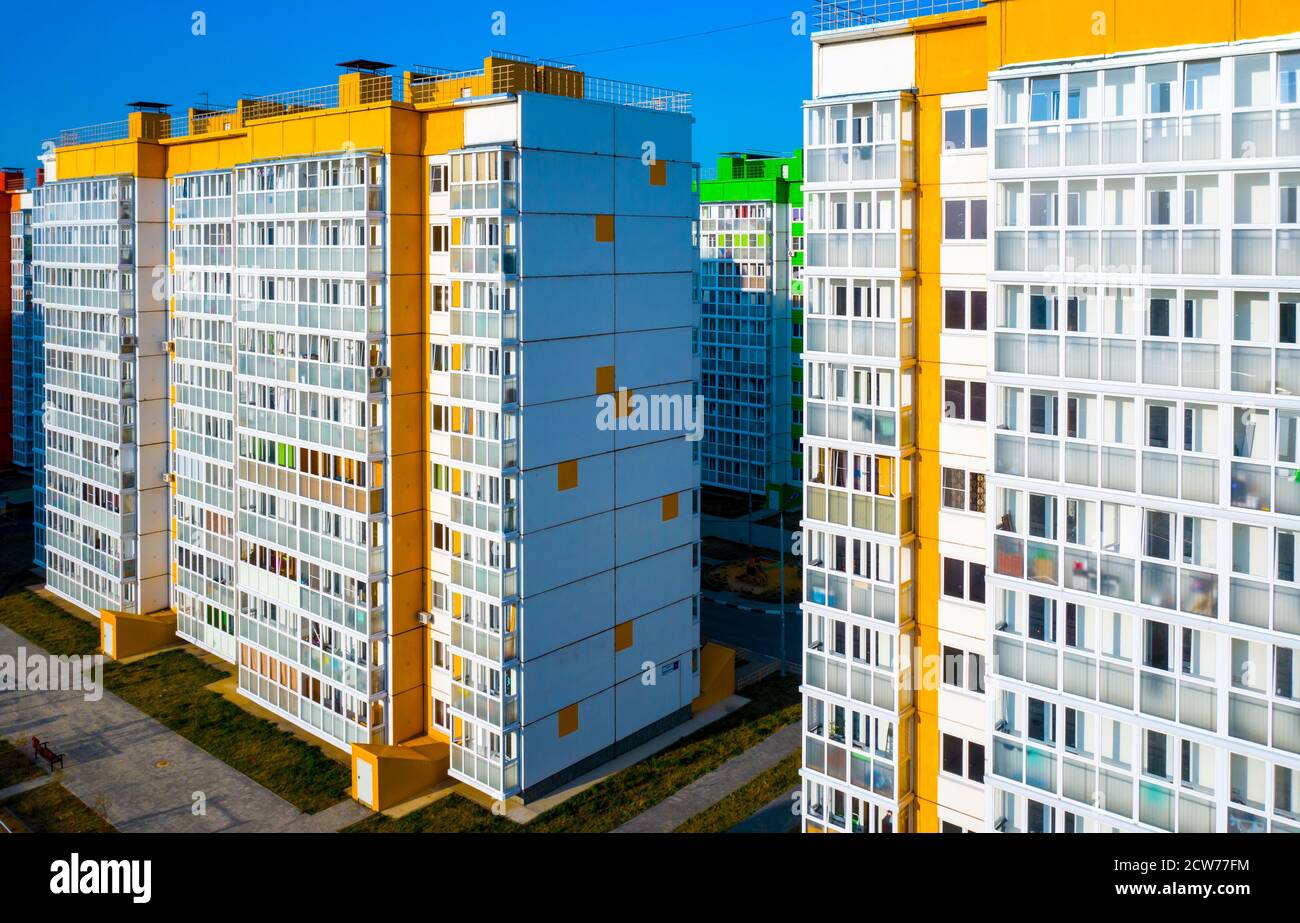 new area with panel multi - storey buildings painted in different ...