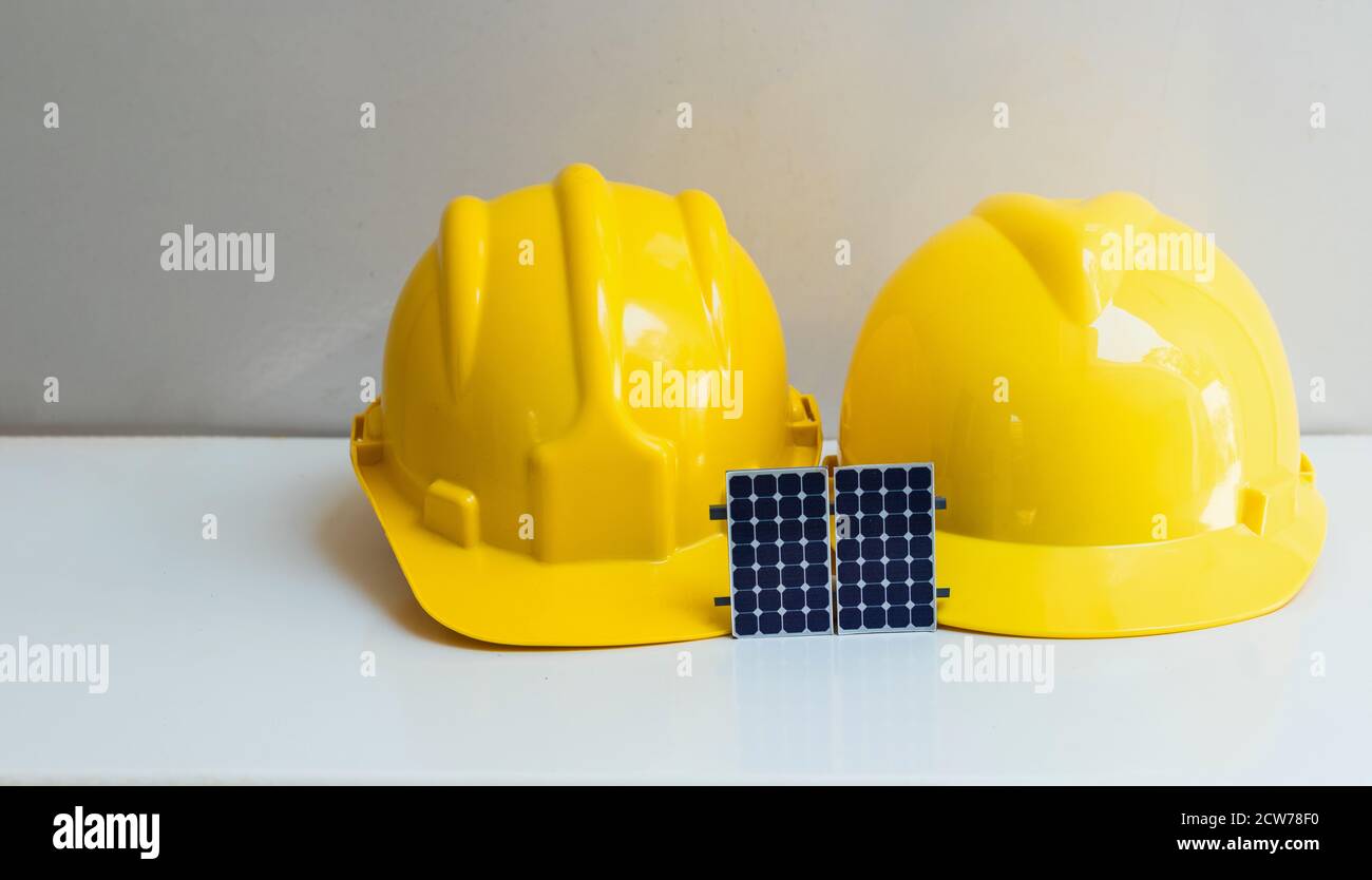 Solar Cell Energy concept image. Solar panel, safety helmet and work ...