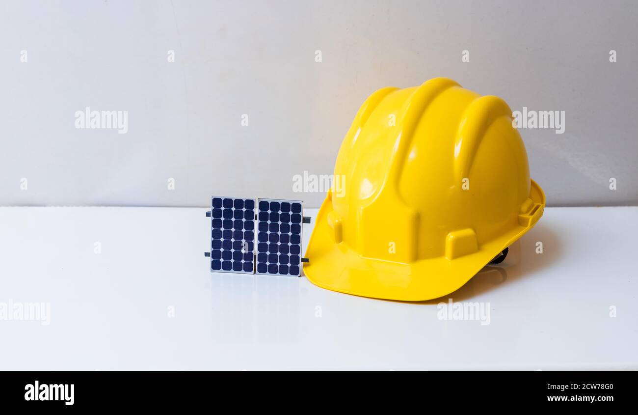 Solar Cell Energy concept image. Solar panel, safety helmet and work ...