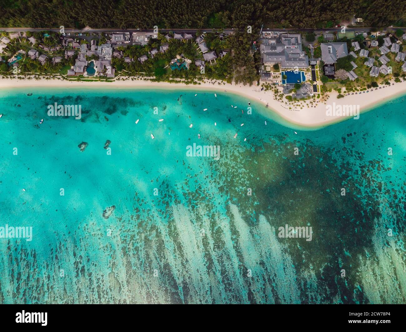 Luxury beach with resorts, palms and blue ocean in Mauritius. Aerial ...