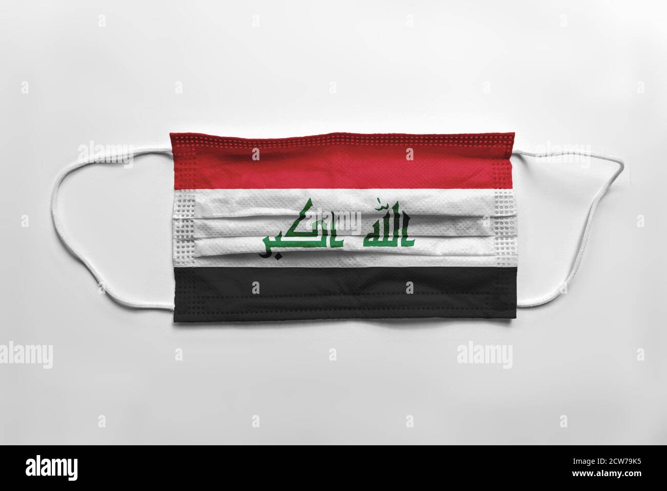 Face mask with Iraq flag printed, on white background, isolated Stock ...