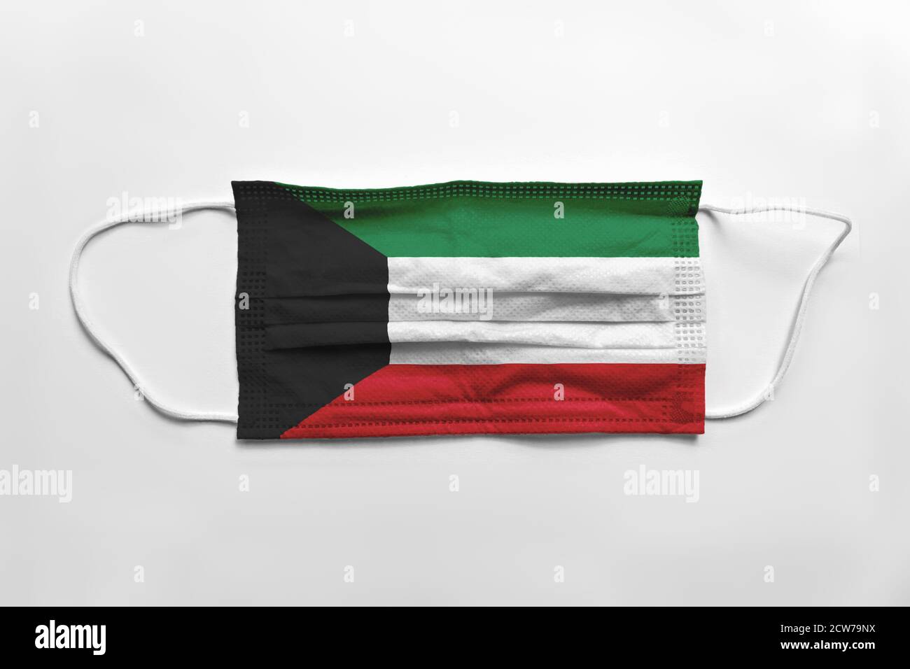Face mask with Kuwait flag printed, on white background, isolated Stock ...