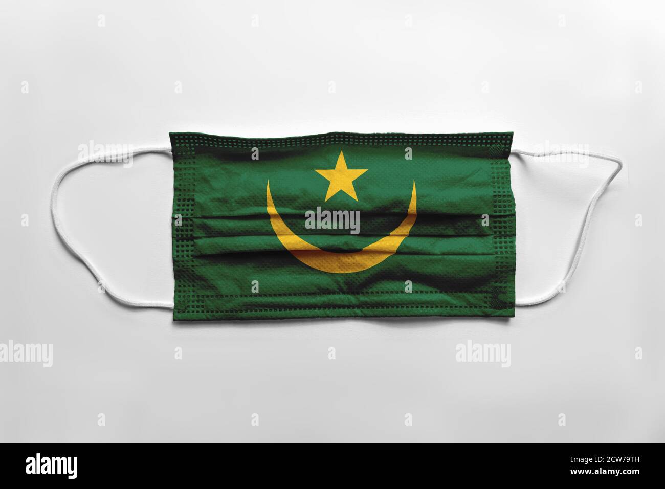 Face mask with Mauritania flag printed, on white background, isolated ...