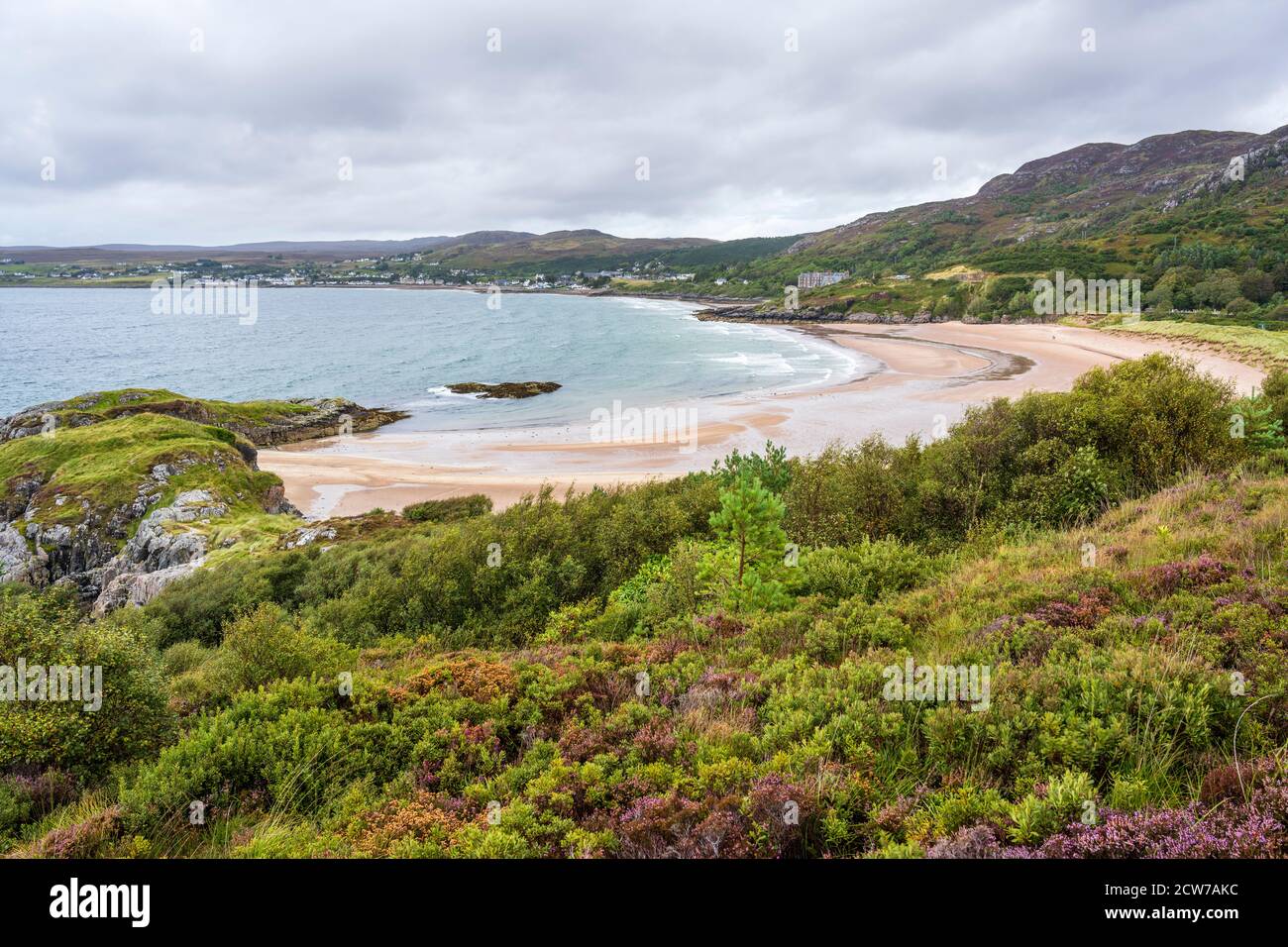 View of Gairloch Beach (Gaineamh Mhòr) looking north with coastal town ...