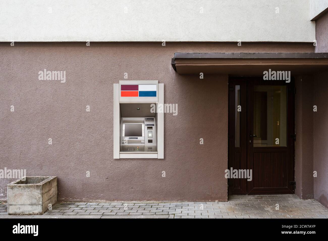 ATM built into a wall in a shopping area Stock Photo - Alamy
