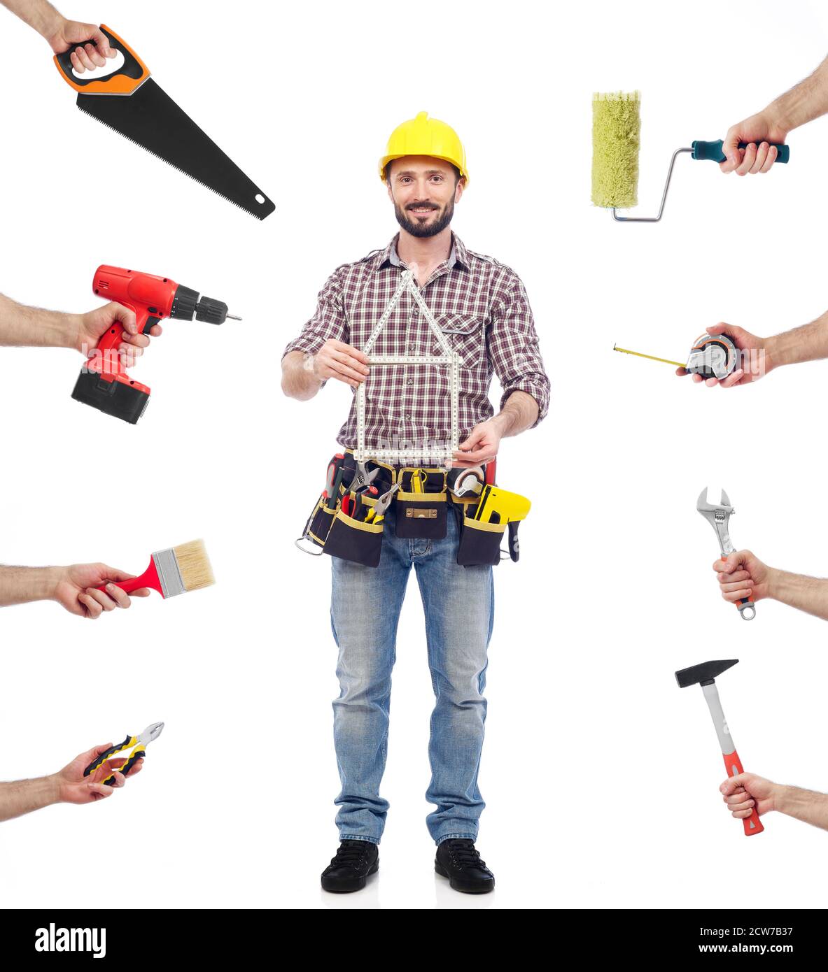 Cheerful carpenter looking at camera with tools all around, white ...