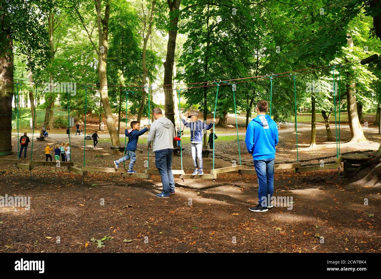 JANKOWICE, POLAND - Sep 06, 2020: Adults and kids by a climb and ...