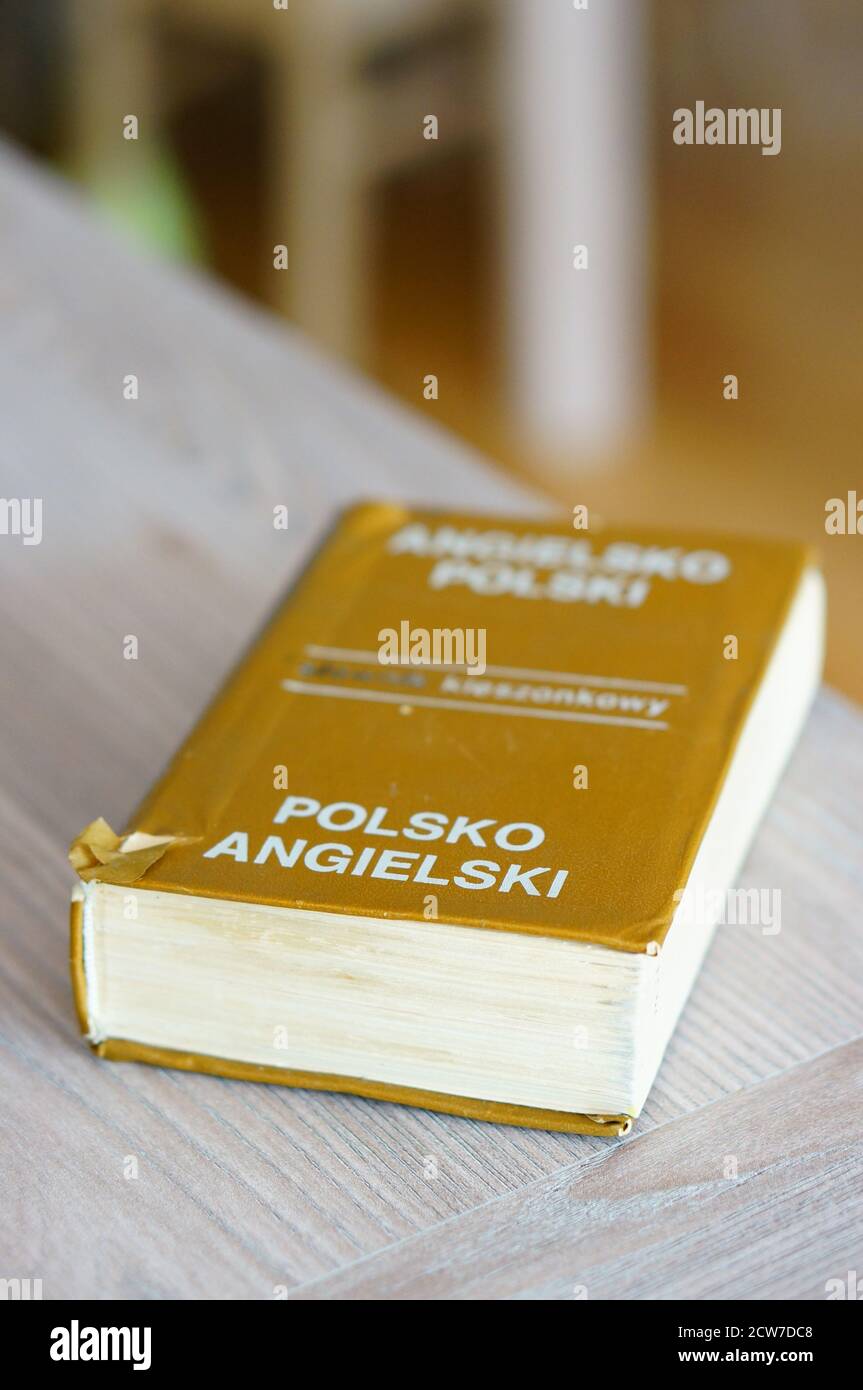 PO, POLAND - Aug 29, 2015: Polish and English dictionary laying on a ...