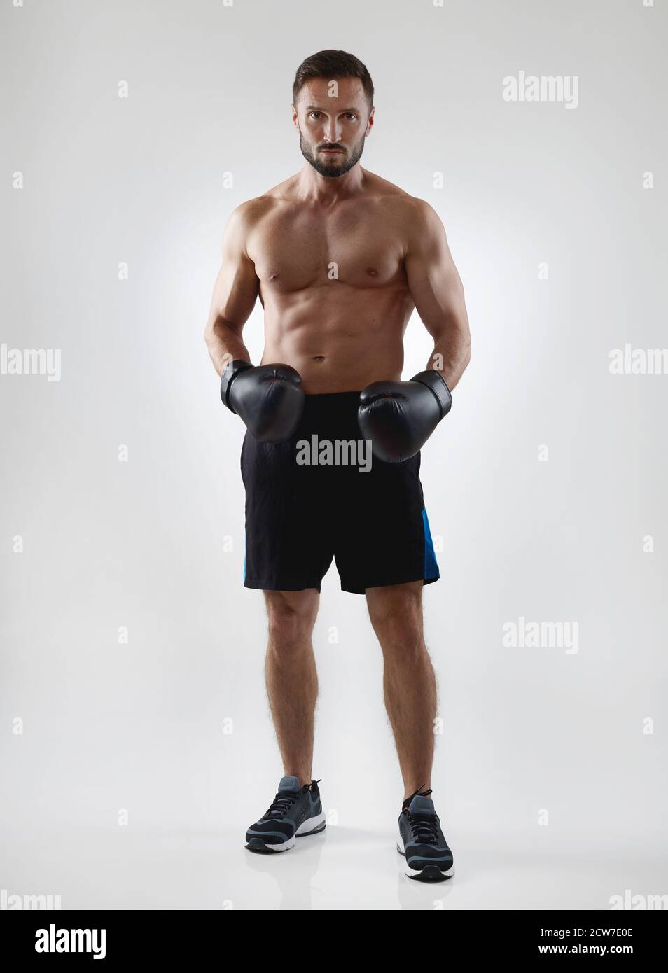 Shirtless boxer looking at camera Stock Photo - Alamy