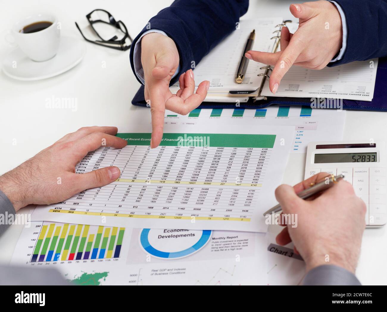 Businesswoman using tablet financial data hi-res stock photography and ...