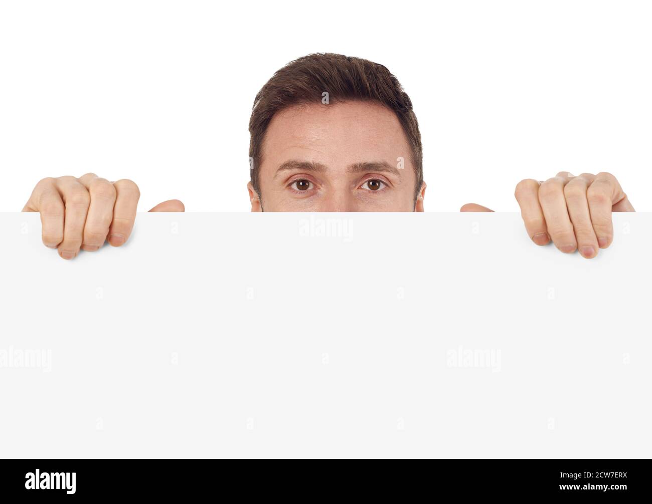 Man with blank sign looking at camera, white background Stock Photo - Alamy