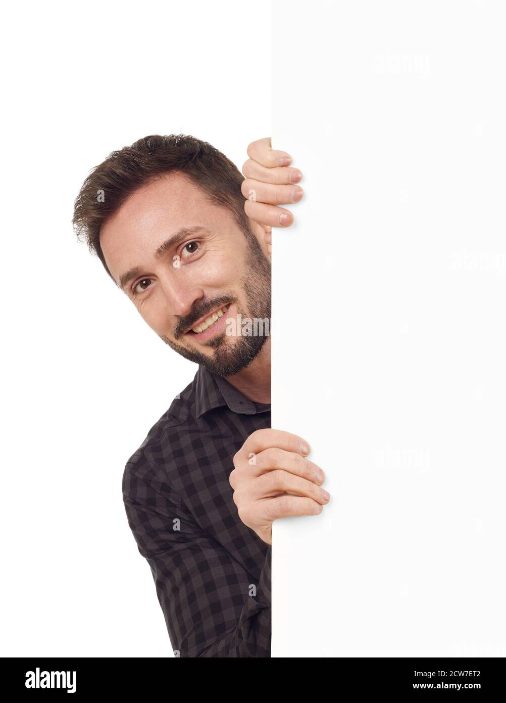 Man with blank sign looking at camera, white background Stock Photo - Alamy