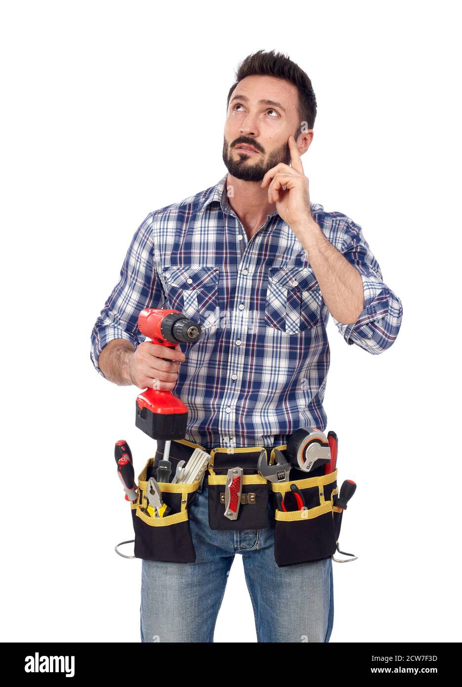 Handyman looking up and thinking, white background Stock Photo - Alamy