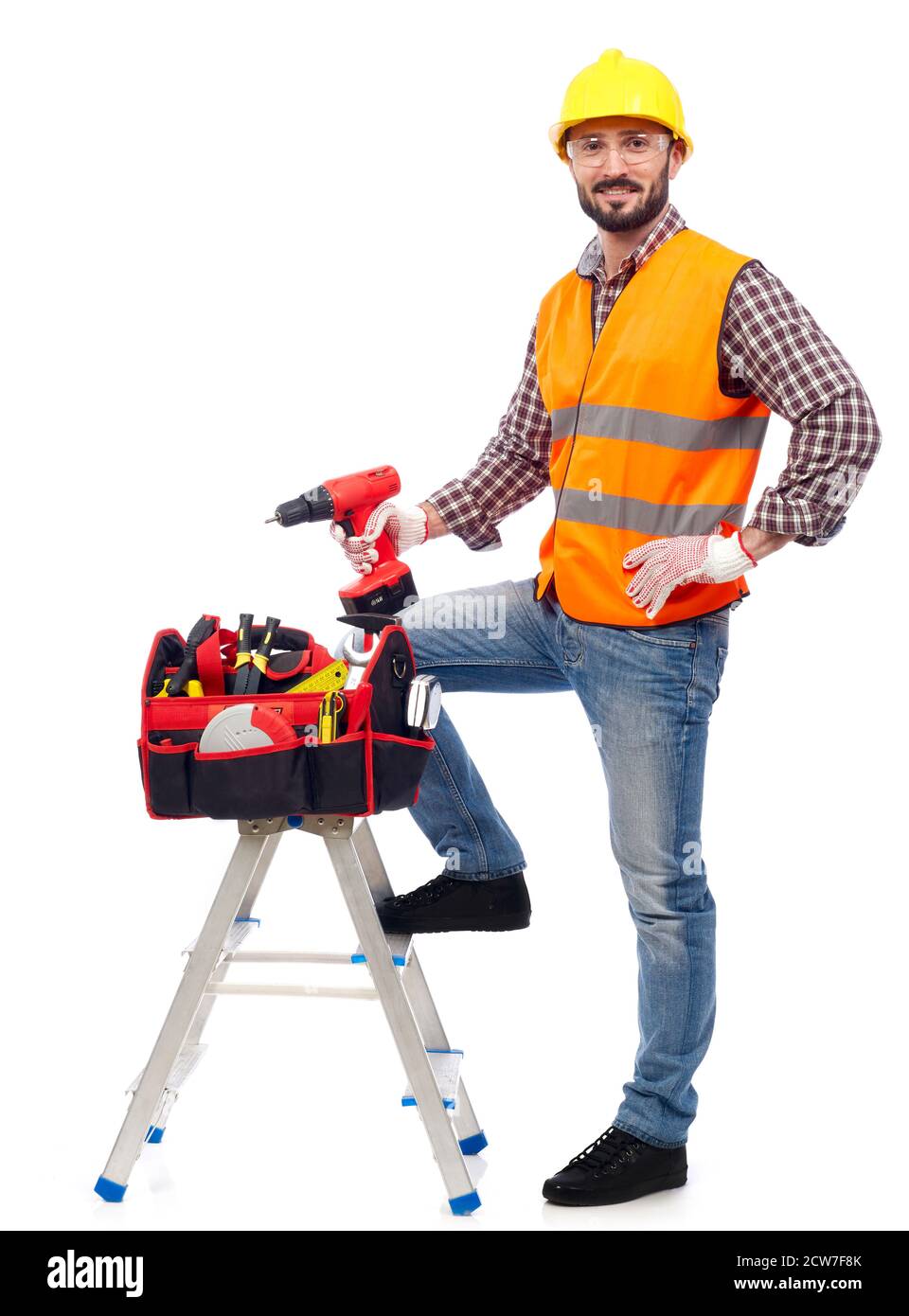 Carpenter with tools looking at camera, white background Stock Photo ...
