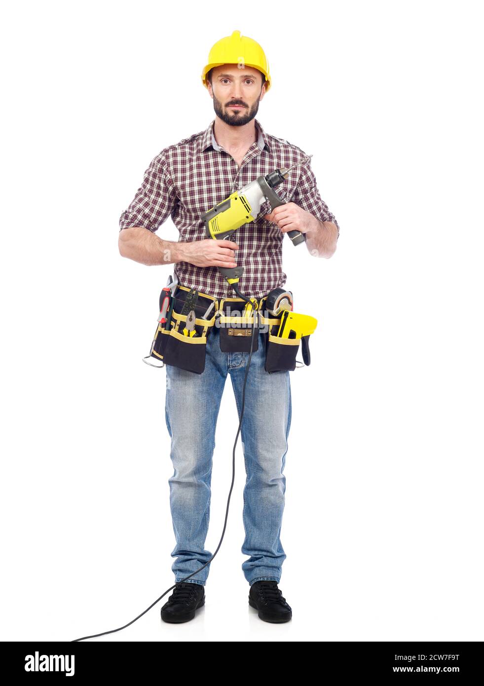 Carpenter holding a drill and looking at camera, white background Stock ...